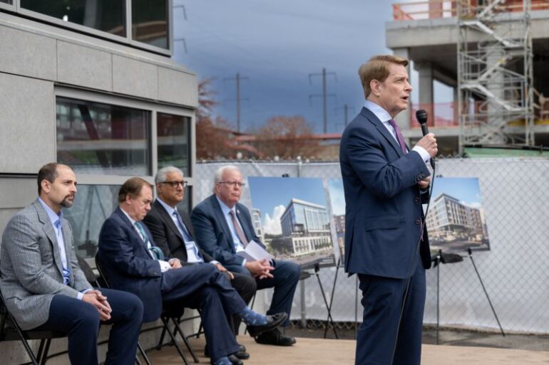 Hackensack Meridian tops off new headquarters, medical office building ...